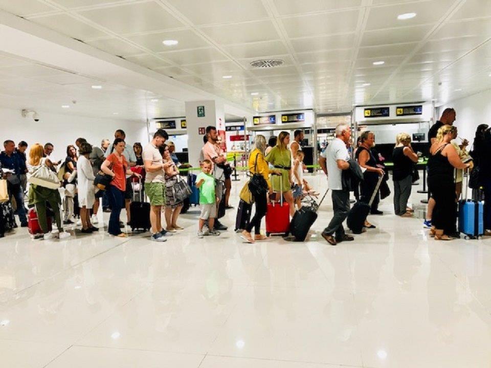 Passport control queues continue