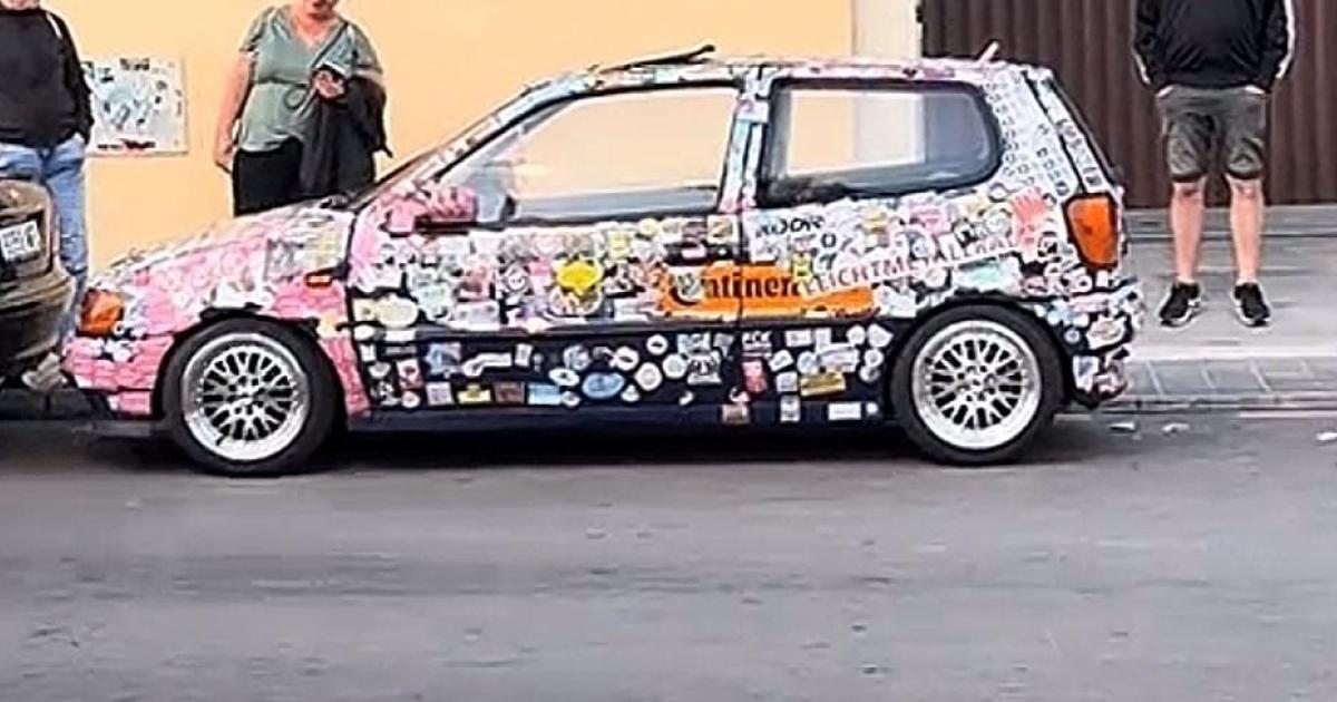 A car covered with stickers in Mallorca